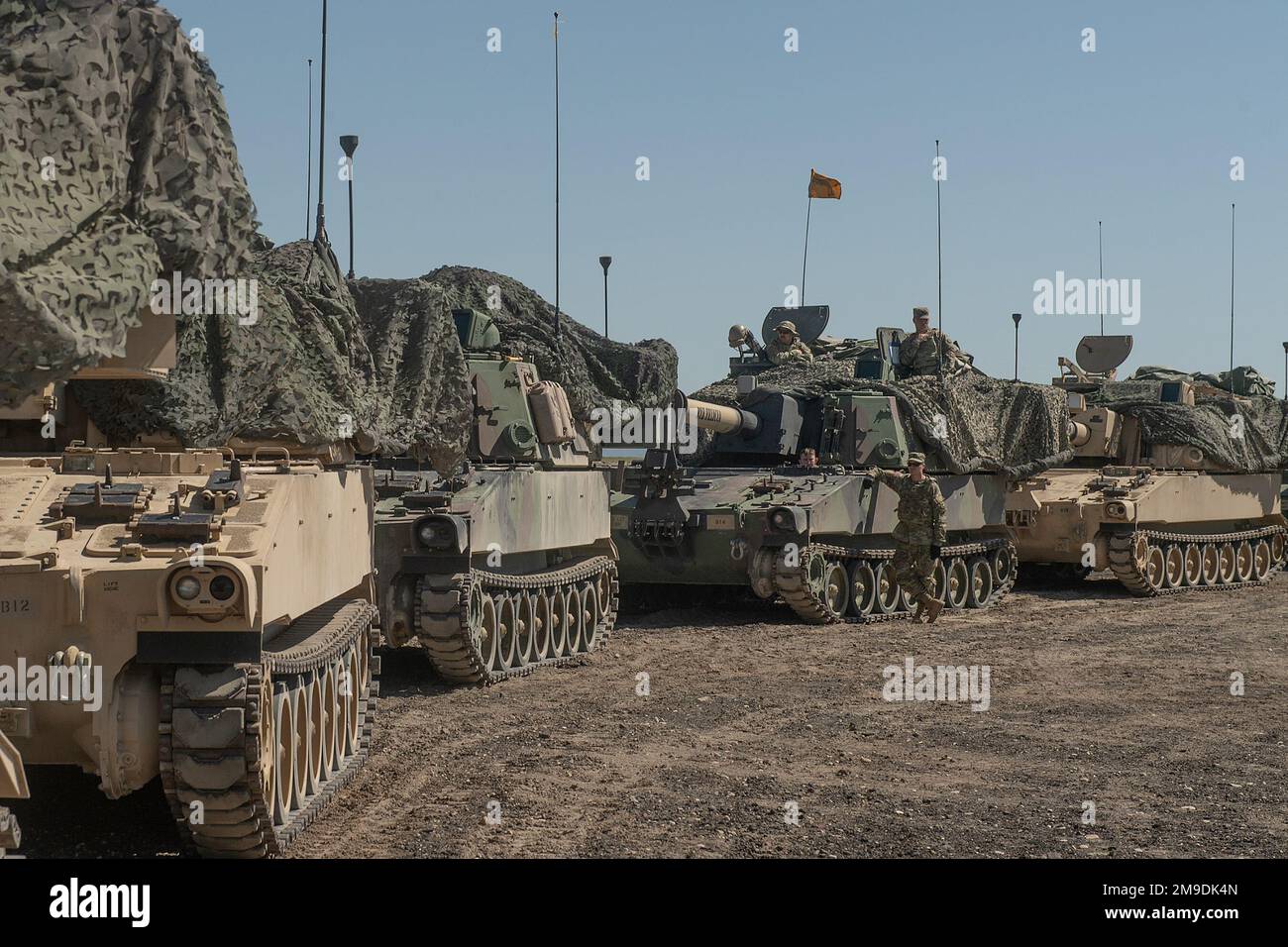 Arriving at their base camp, soldiers from the 148th field Artillery ...