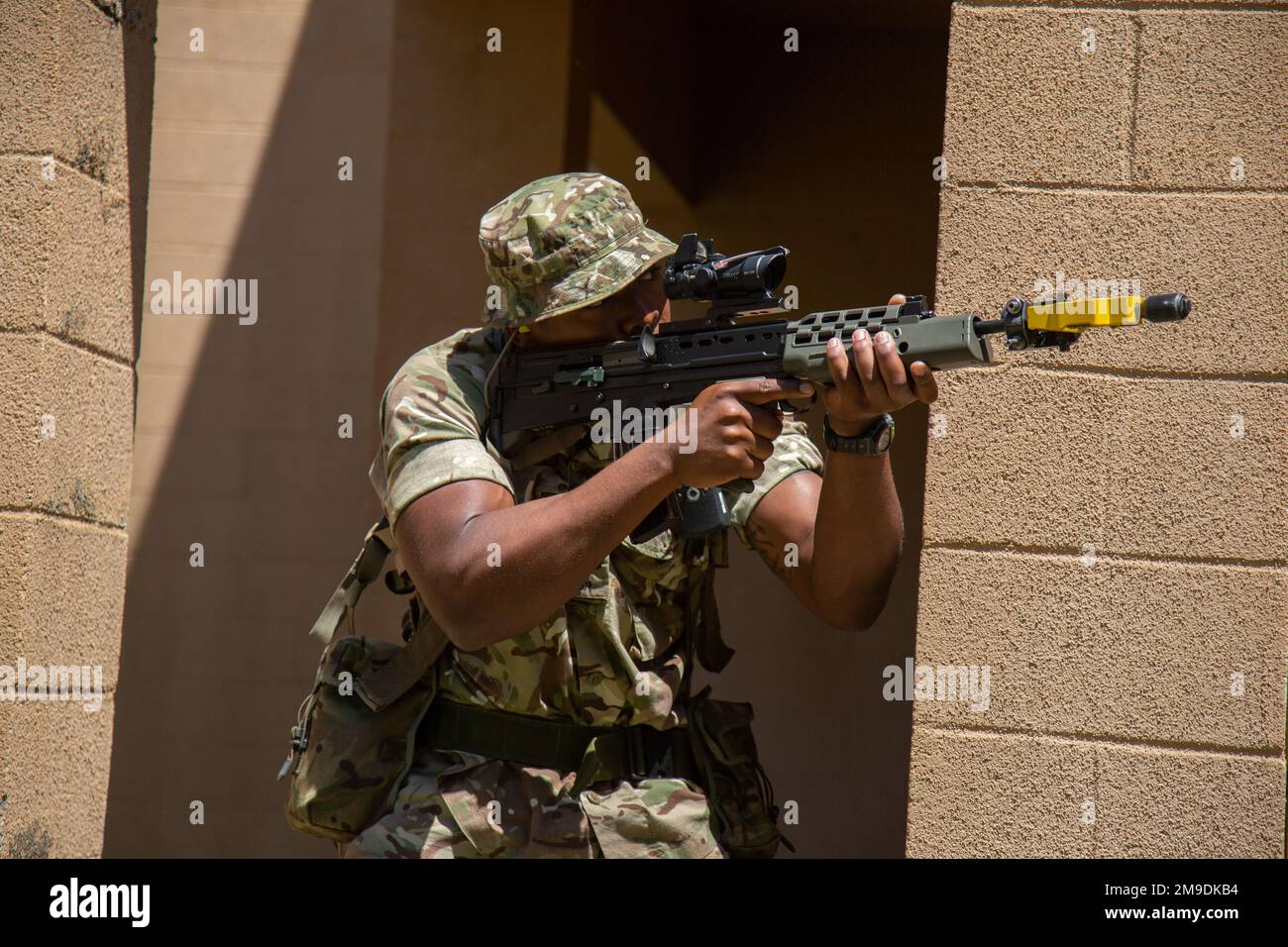 A service member of the Royal Bermuda Regiment provides security while ...