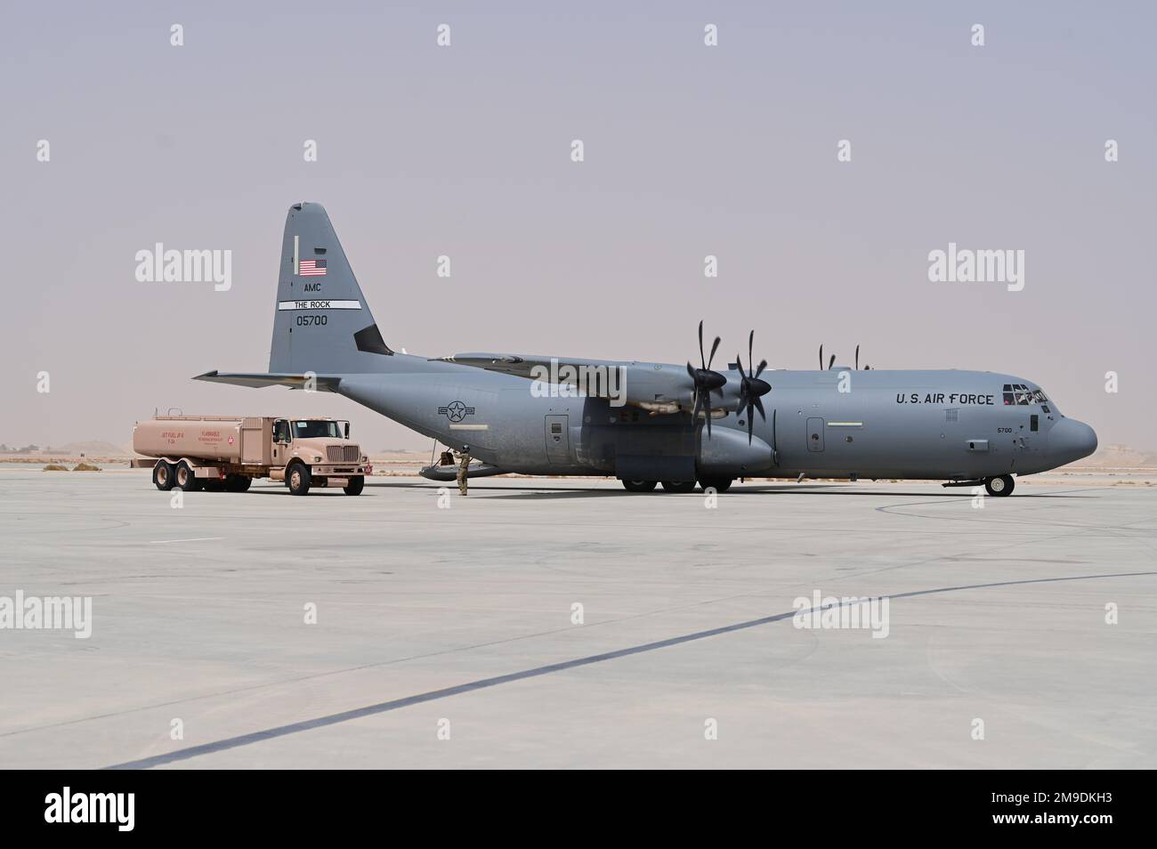 A U.S. Air Force C-130J Super Hercules crew preforms a wet-wing defuel ...