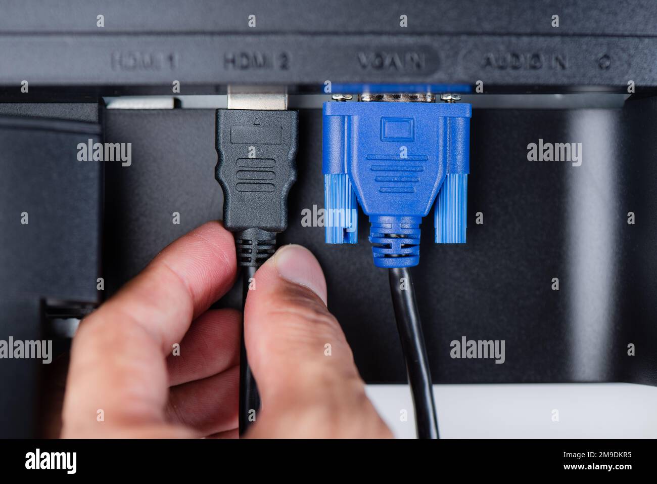 HDMI and VGA connector connected to the monitor Stock Photo - Alamy