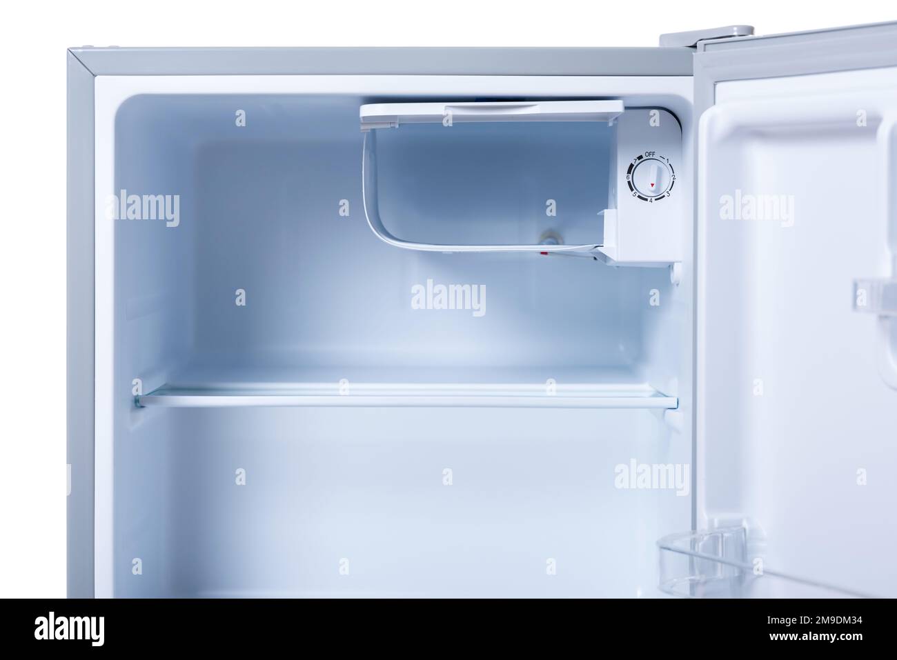 Opened mini fridge, minibar refrigerator isolated over white background ...