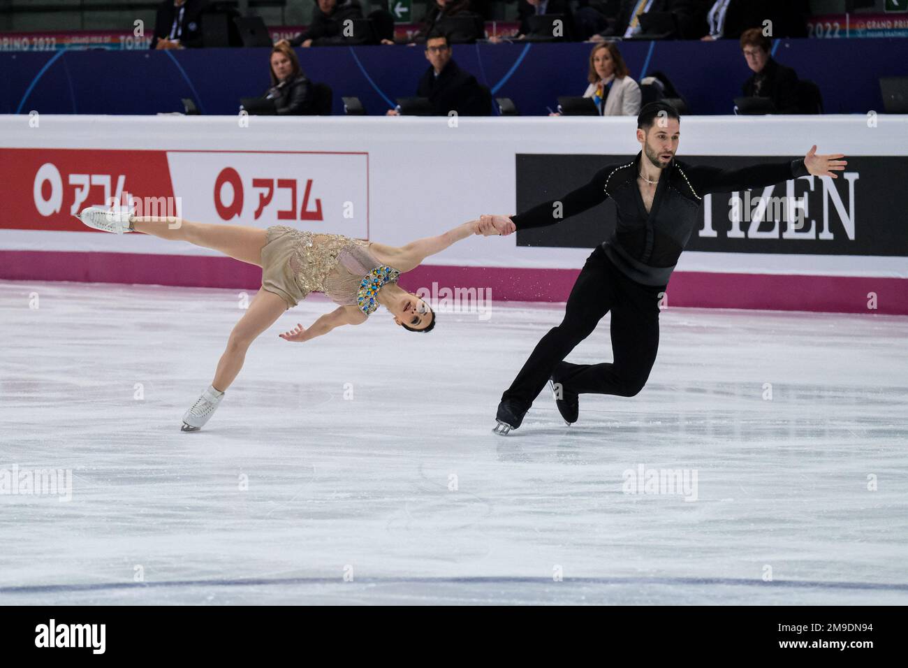(L-R) Deanna Stellato-Dudek and Maxime Dechamps (CAN) perform during ...