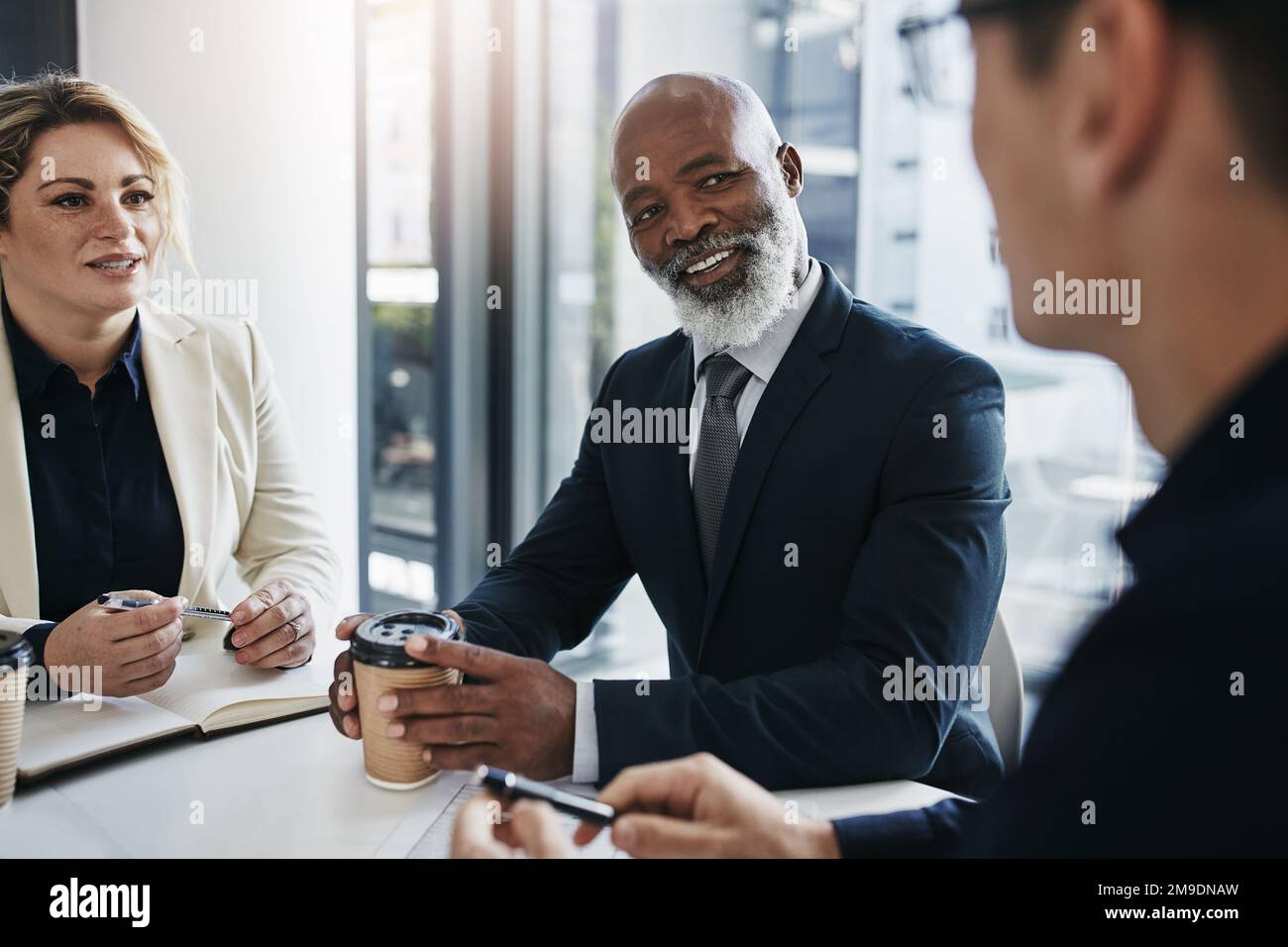 Meeting, discussion and black man leader talking to his colleagues at a ...