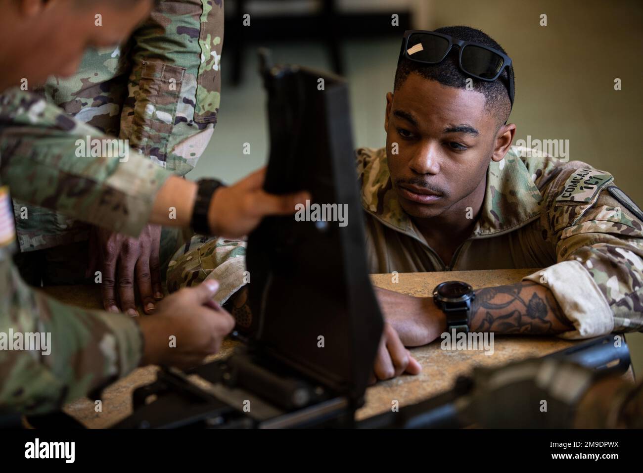 U.S. Army Sgt. Sidney Perry, a visual information specialist assigned ...