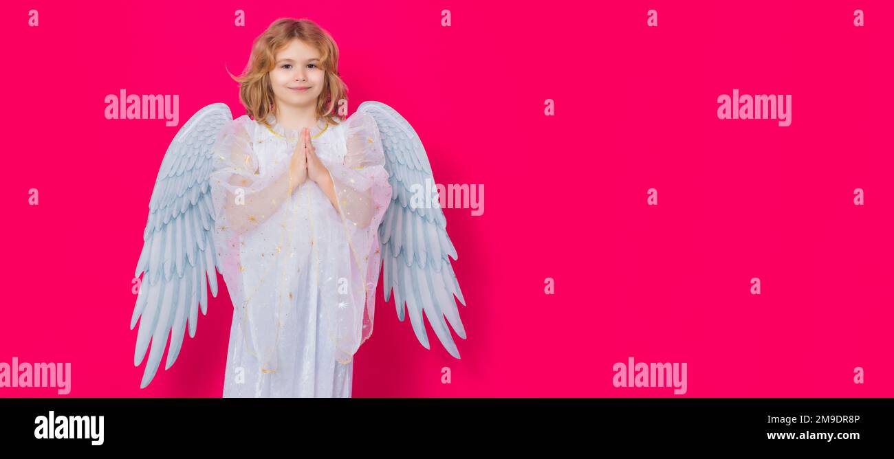 Angel prayer kids. Valentine's day. Blonde cute child with angel wings ...