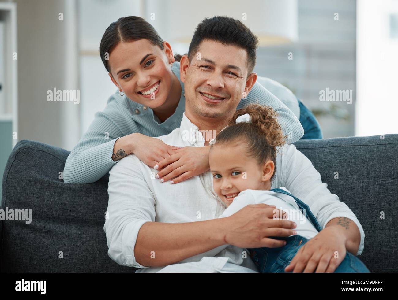 My family bring me peace. a young family together at home Stock Photo ...