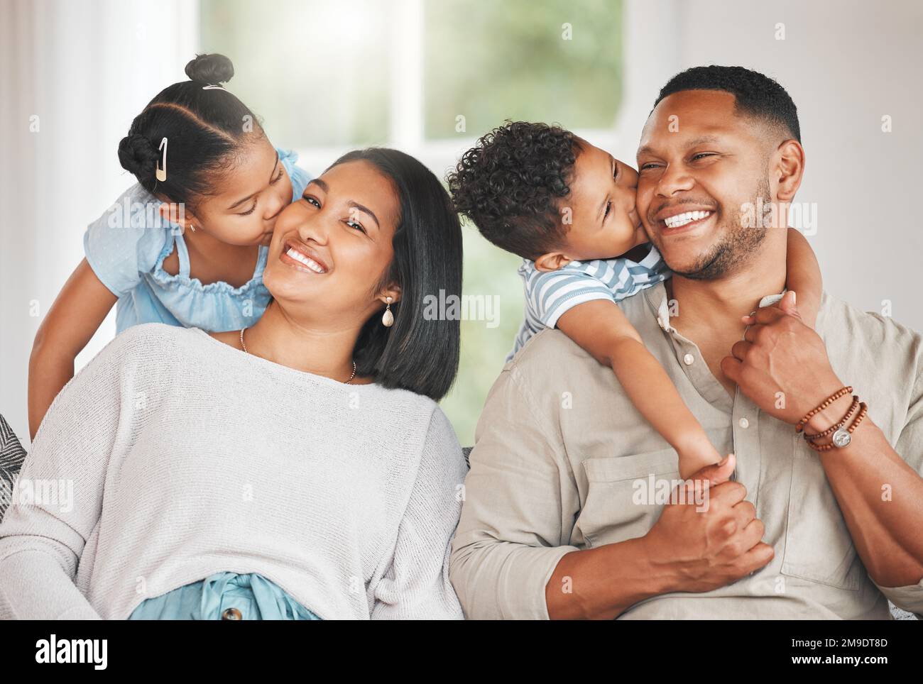 A childs love is the purest form. a young family happily bonding ...