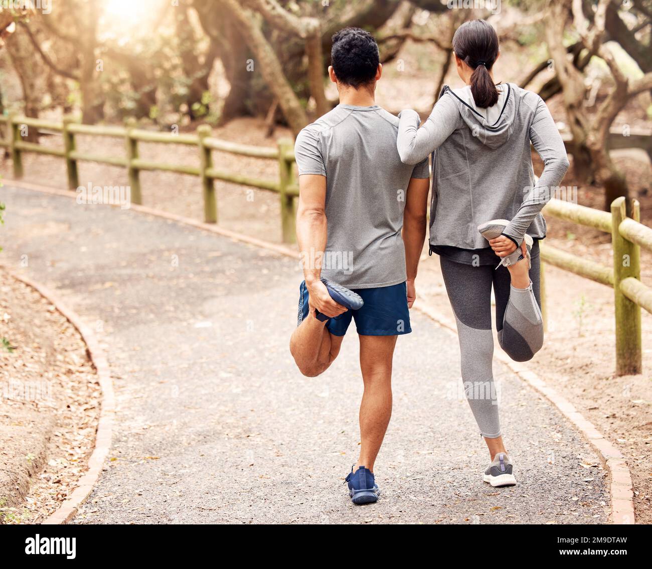 Getting fit helps you go the distance. Rearview shot of a young couple ...
