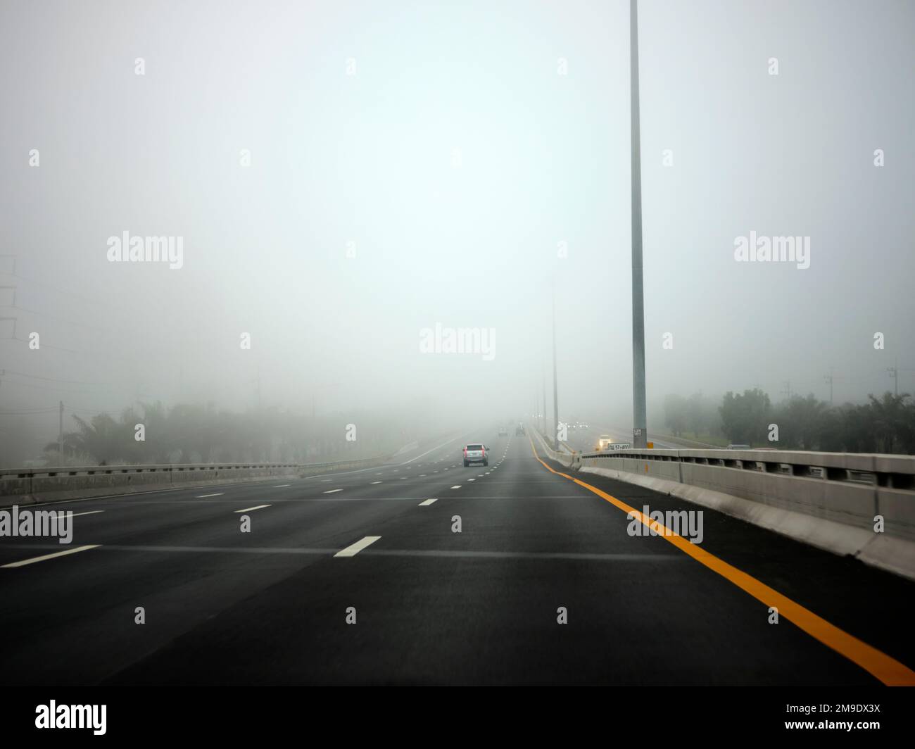 Road in the fog, sign mention keep distance for Motorway-t7.svg ...