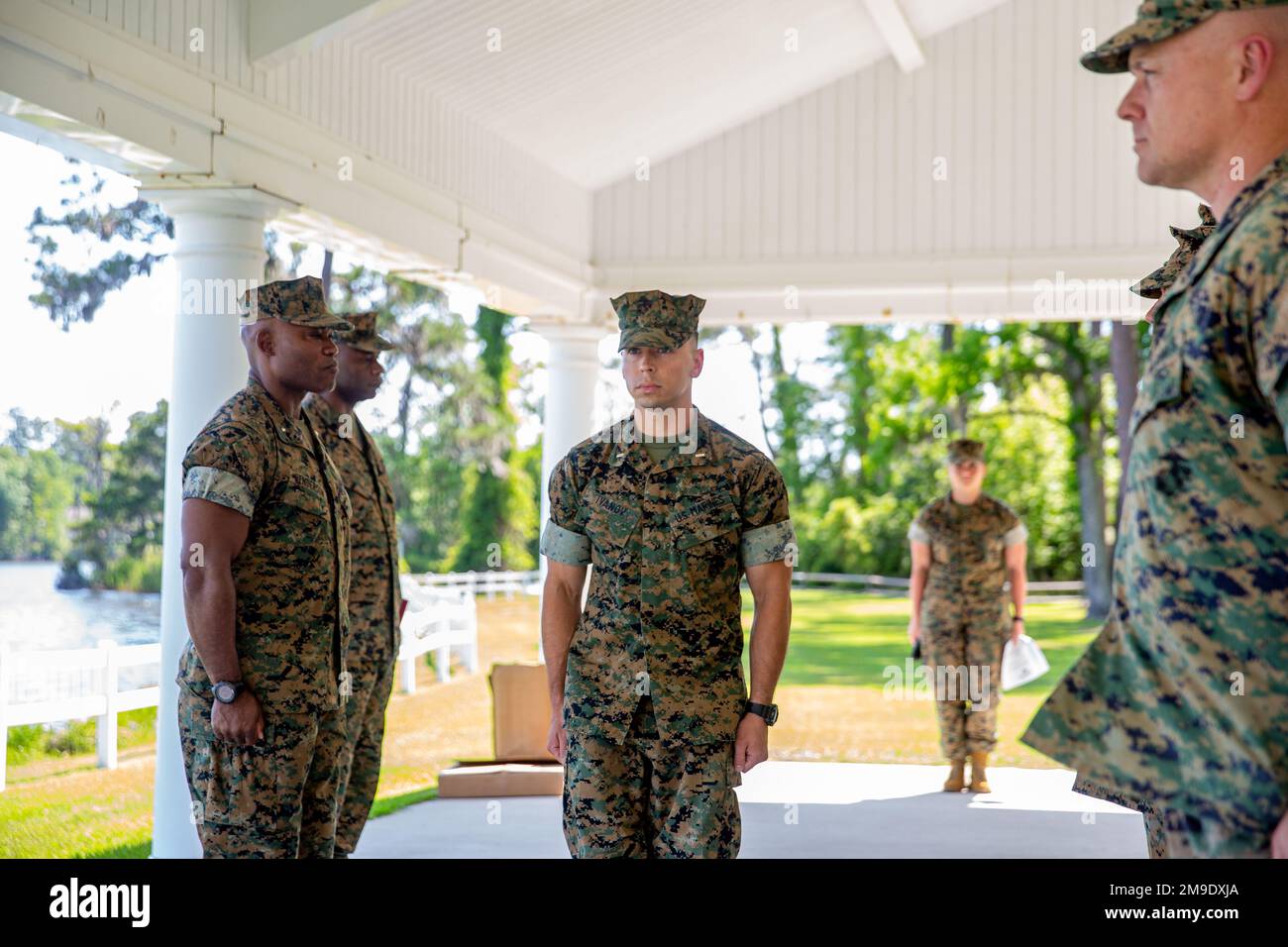 U.S. Marine Corps Brig. Gen. Anthony Henderson presents a Navy ...