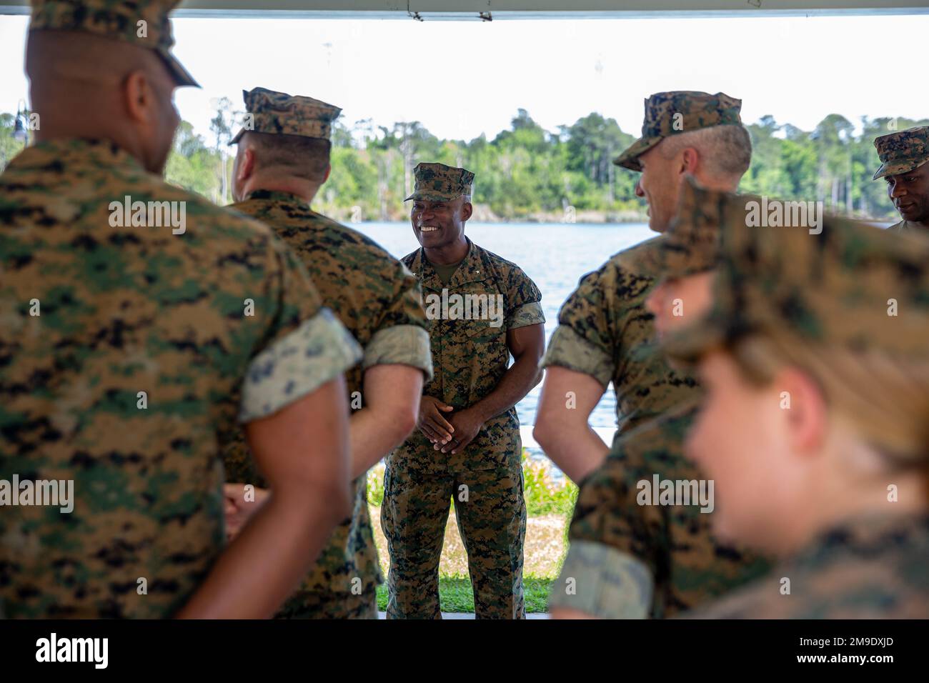 U.S. Marine Corps Brig. Gen. Anthony Henderson presents a Navy ...