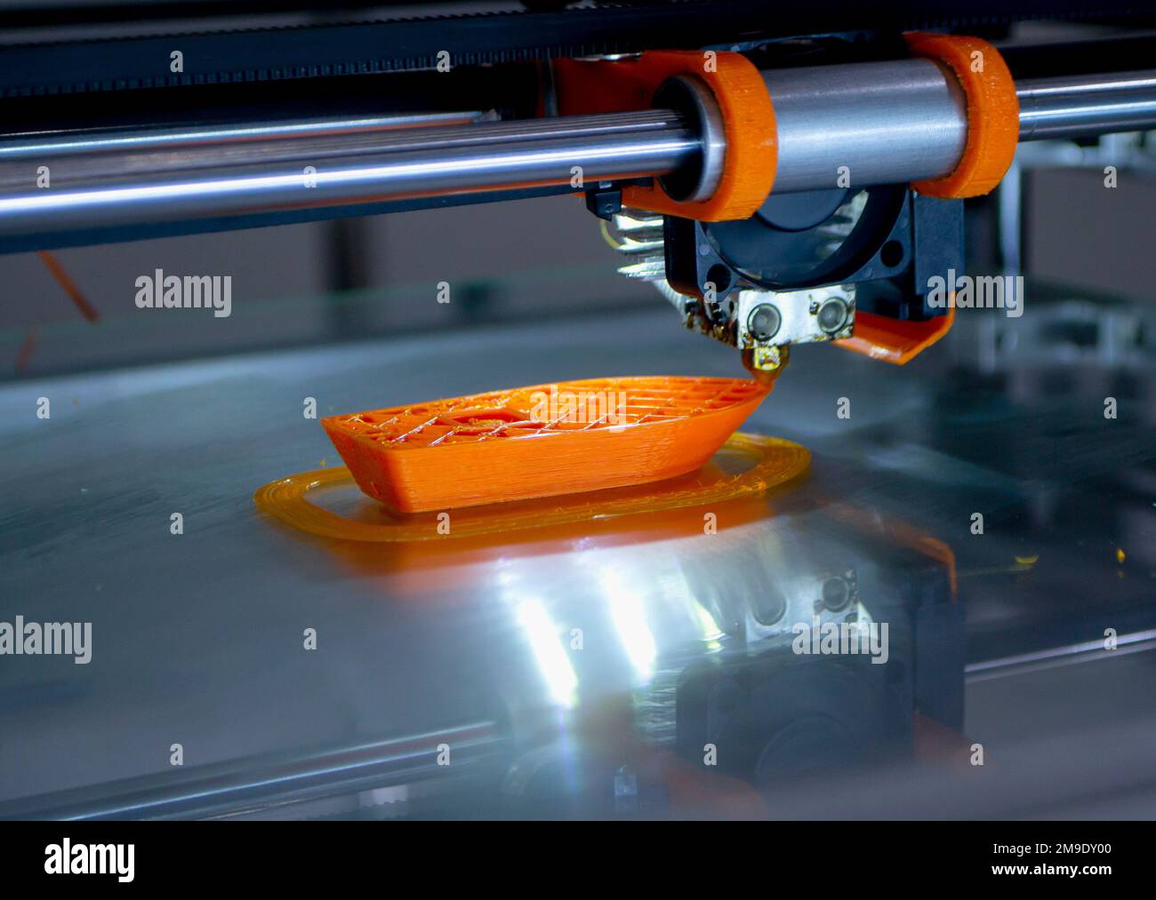 3d printer printing a model close-up. The process of printing a model ...