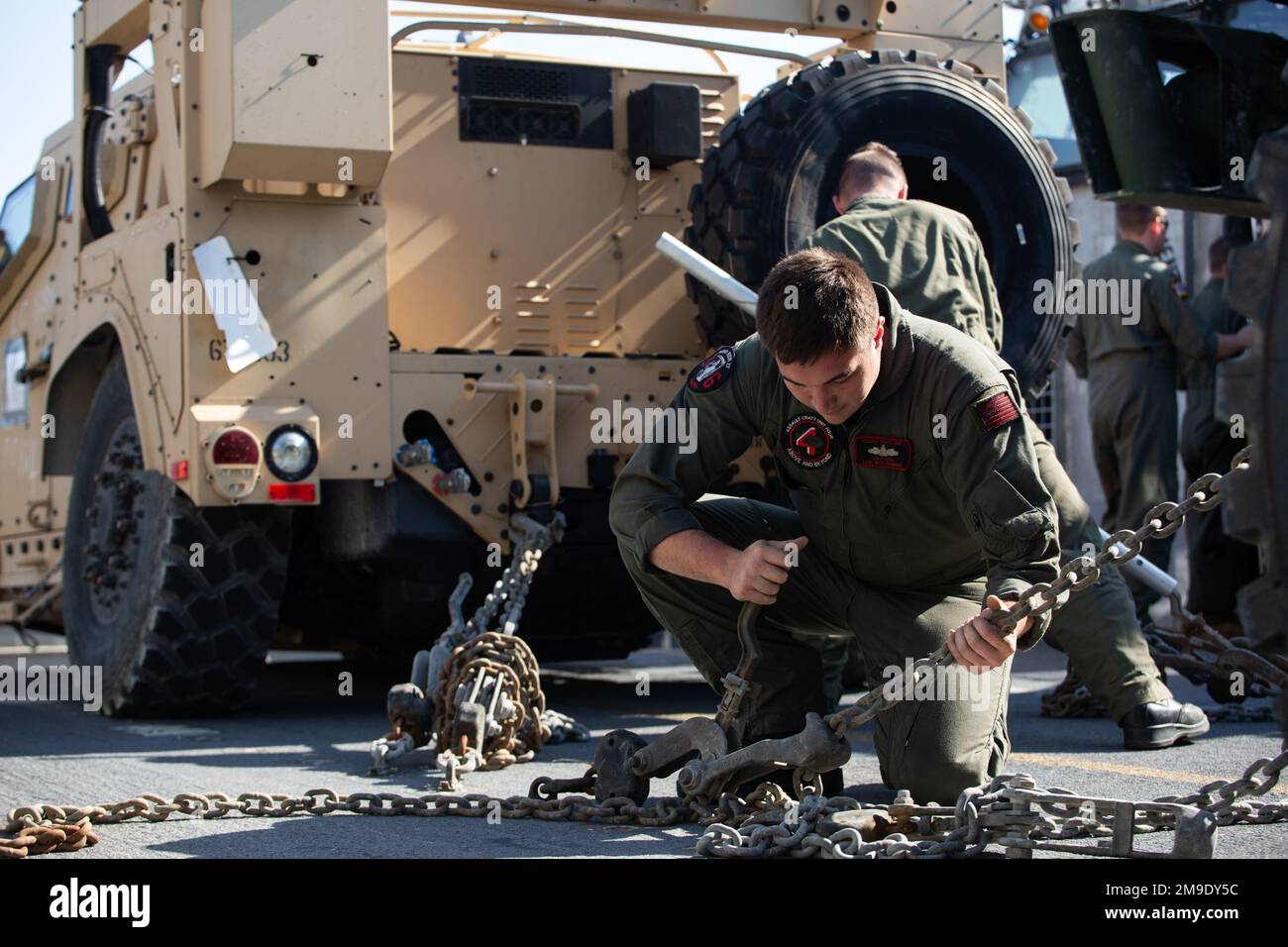 U.S. Navy Seaman Johnaton Little, a ramp marshall with Beachmaster Unit ...