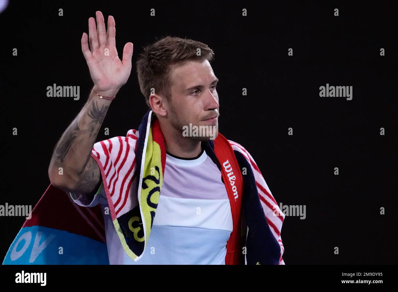 Alex Molcan of Slovakia waves as he leaves the court after his second ...