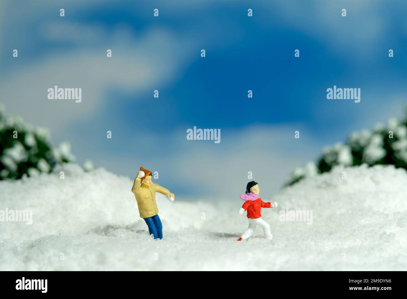 Miniature people toy figure photography. Winter holiday. Kids brother ...