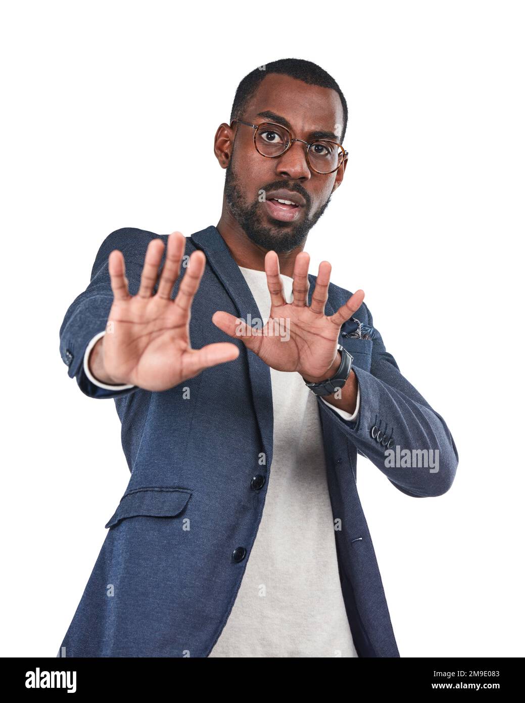 Shock, stop and portrait of a black man in a studio with a scared, fear and terrified face ...