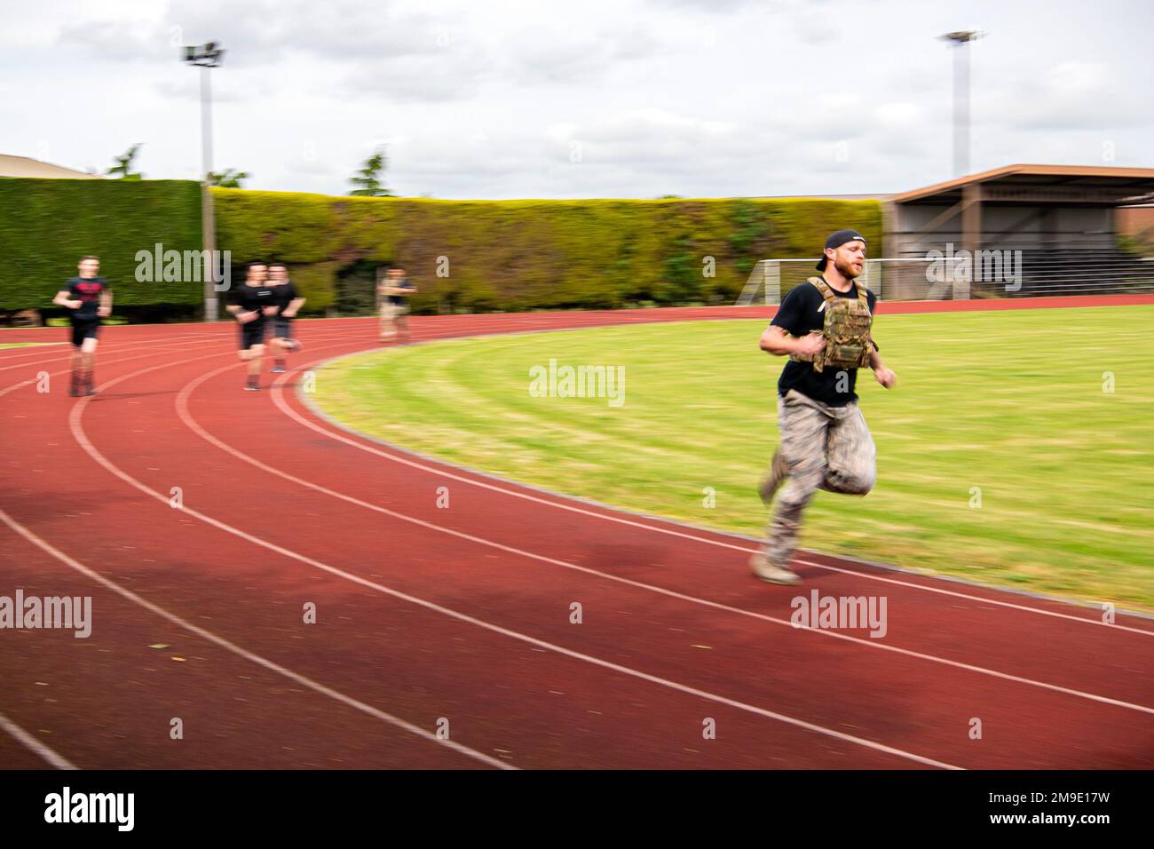Participants from the 423d Security Forces Squadron run a lap as part ...