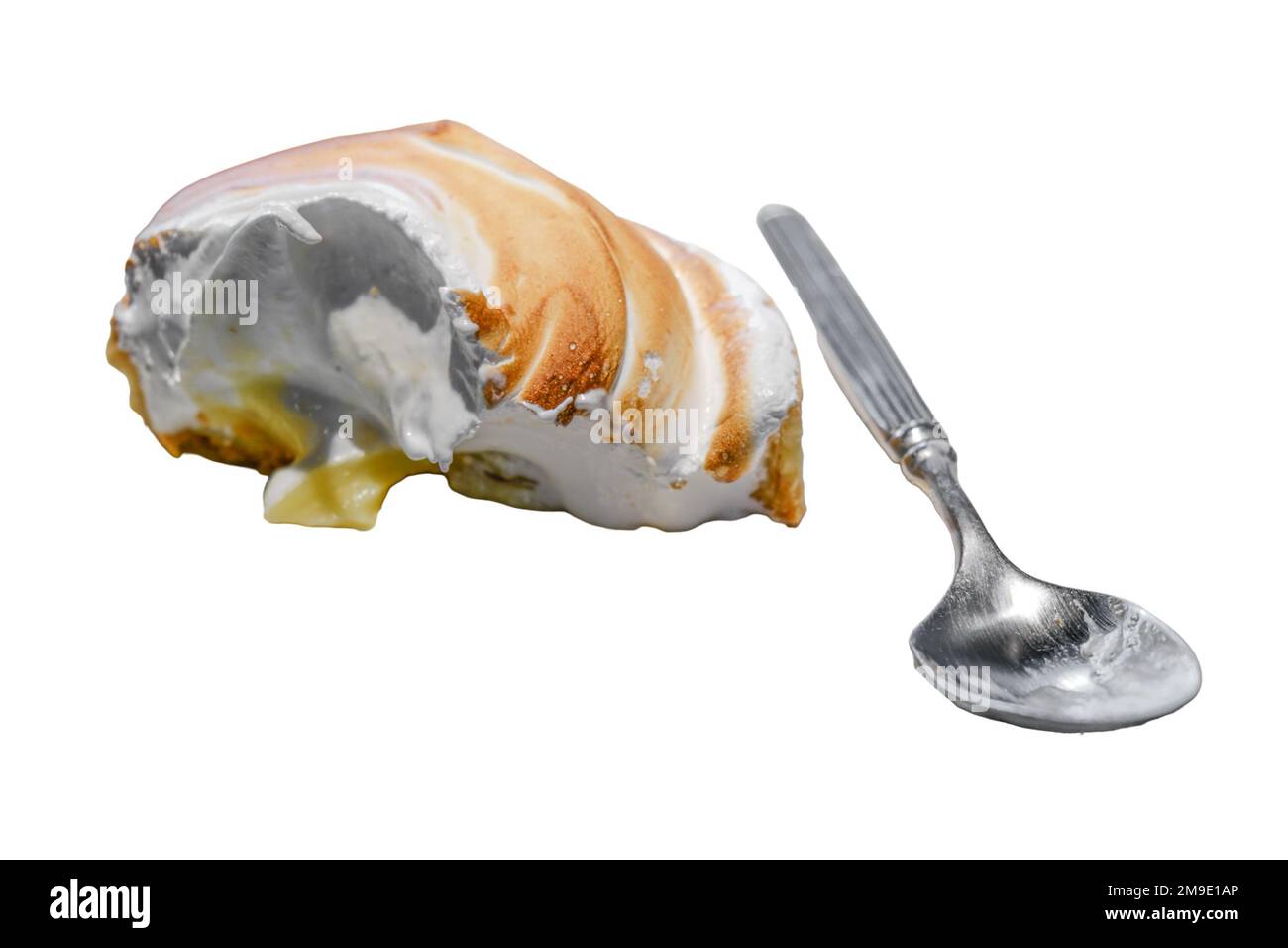 Bitten cream cake with a teaspoon, isolated on a white background Stock ...