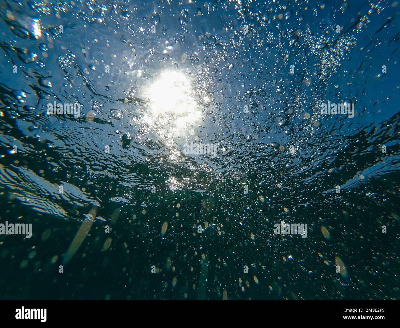 sea surface with bubbles of air in transparent clean water Stock Photo ...