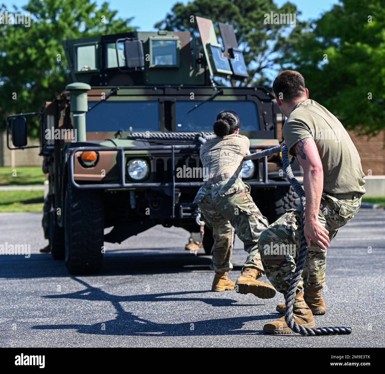 U.S. Airmen from the 633d Security Forces Squadron pull an up-armored ...