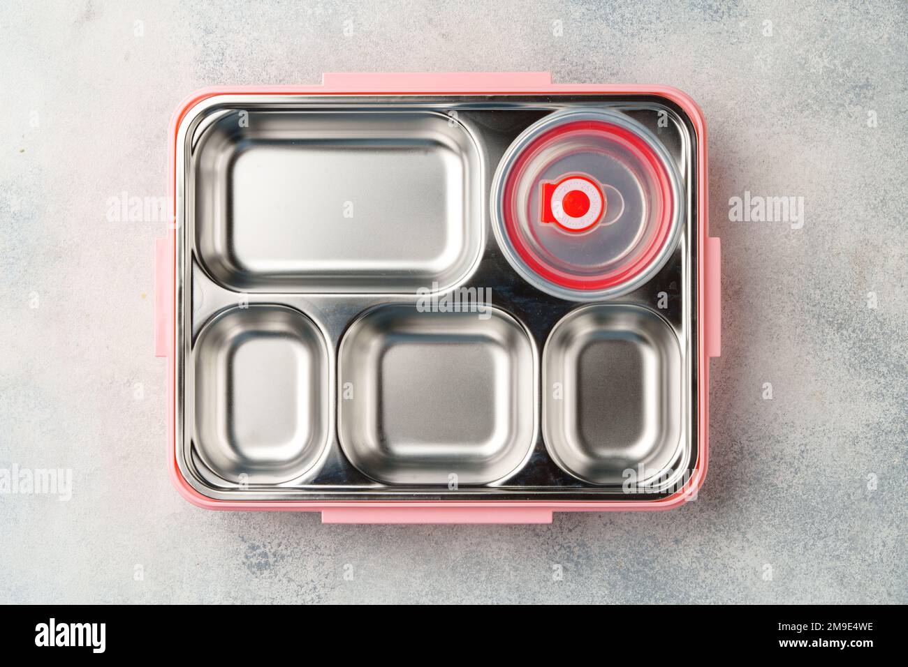 Plastic empty lunch box with metal compartments Stock Photo - Alamy
