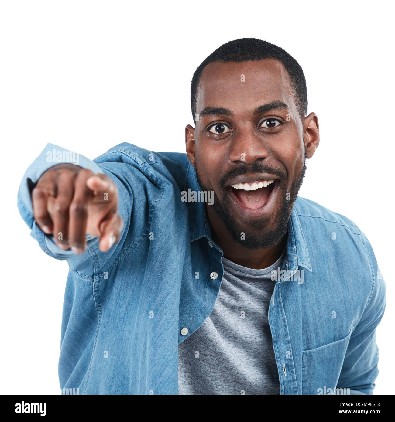 Black man, pointing and studio portrait with smile, excited and ...