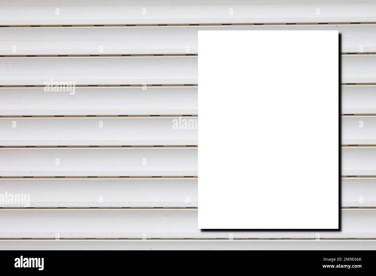 white blank paper sheet with shadow on old wooden plank desk background ...