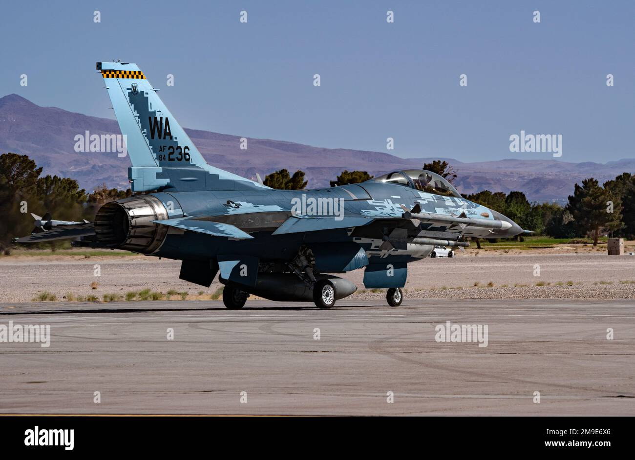 An F-16C Falcon assigned to the 64th Aggressor Squadron, taxis prior to ...