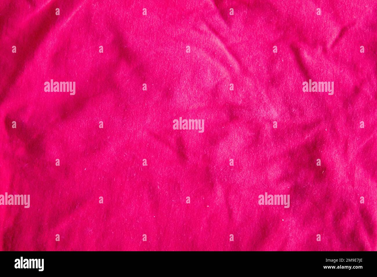 pink cotton texture canvas fabric background with folds detail of ...