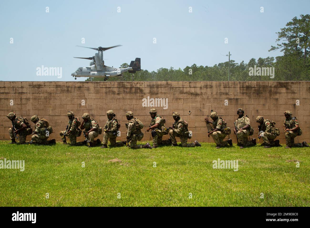 The Royal Bermuda Regiment prepares to board an MV-22B Osprey at the ...