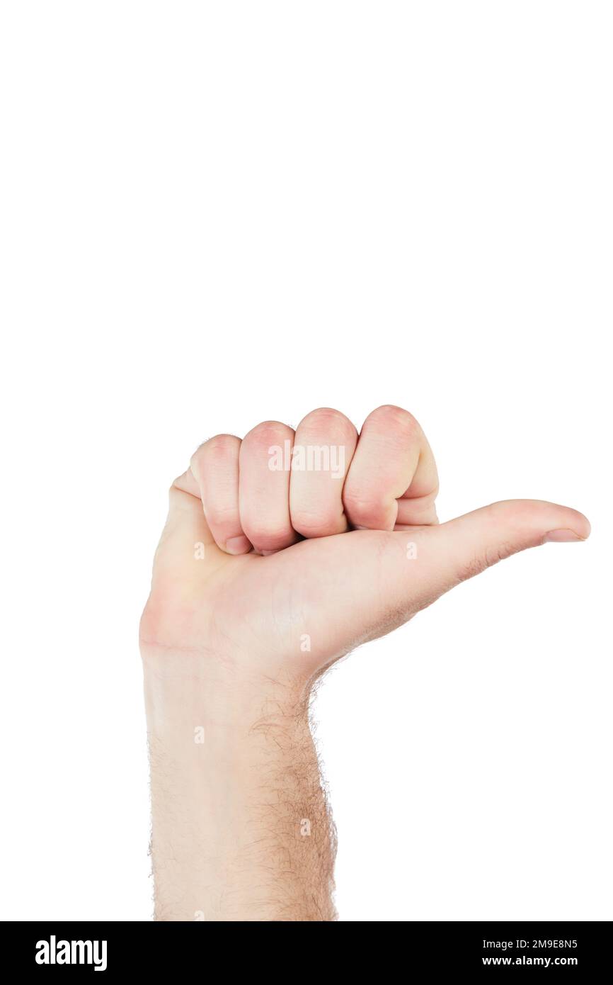 Hand, communication and man thumb pointing in a studio for sign ...