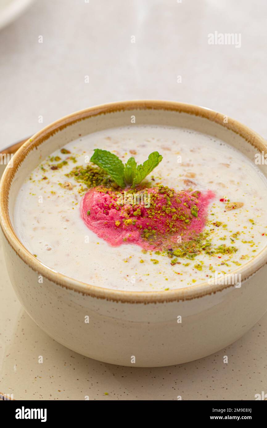 Mixed cereal porridge with berry sorbet Stock Photo - Alamy