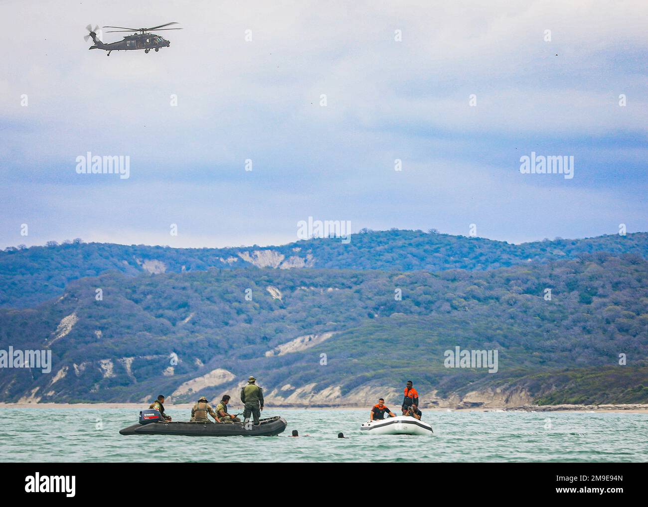 Safety boats with members from U.S. and Ecuador partner forces observe ...