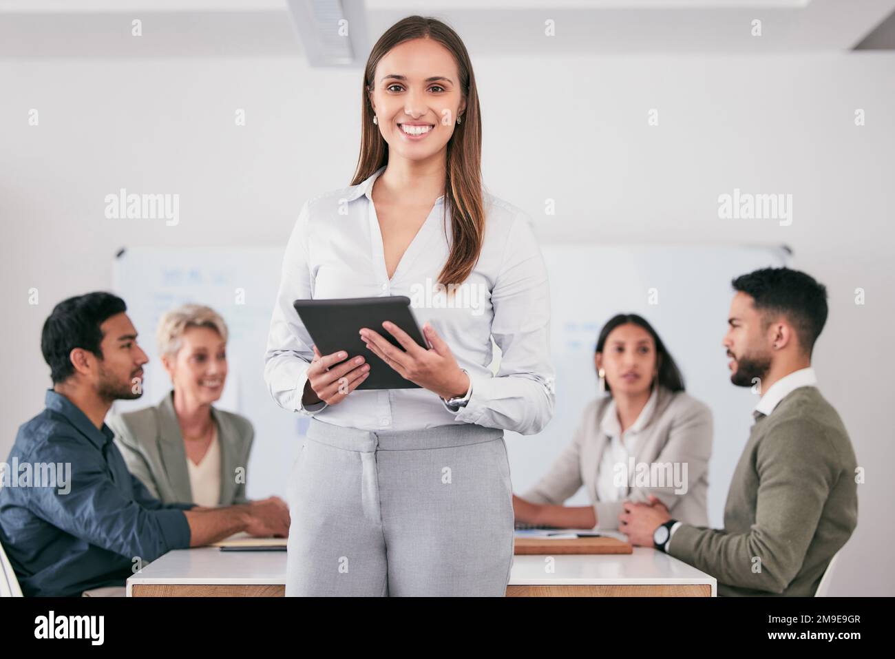 My job is my life. a young businesswoman using her digital tablet Stock ...