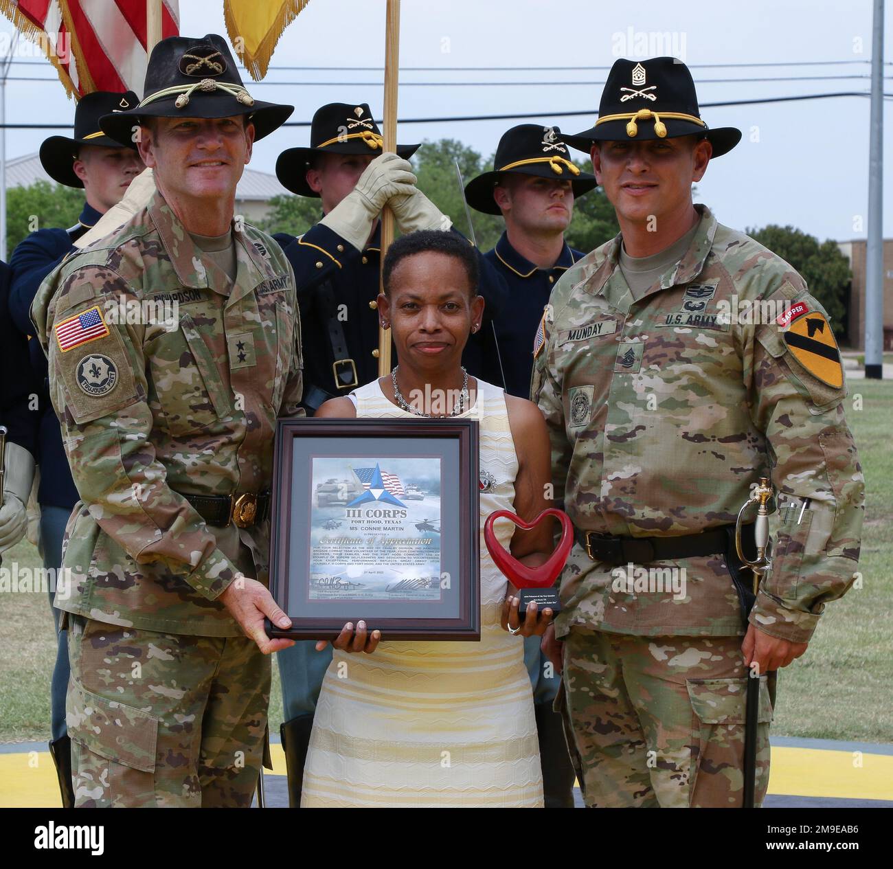 Mrs. Connie Martin, 2D Armored Brigade Combat Team, receives the 'Heart' trophy during the 1st ...