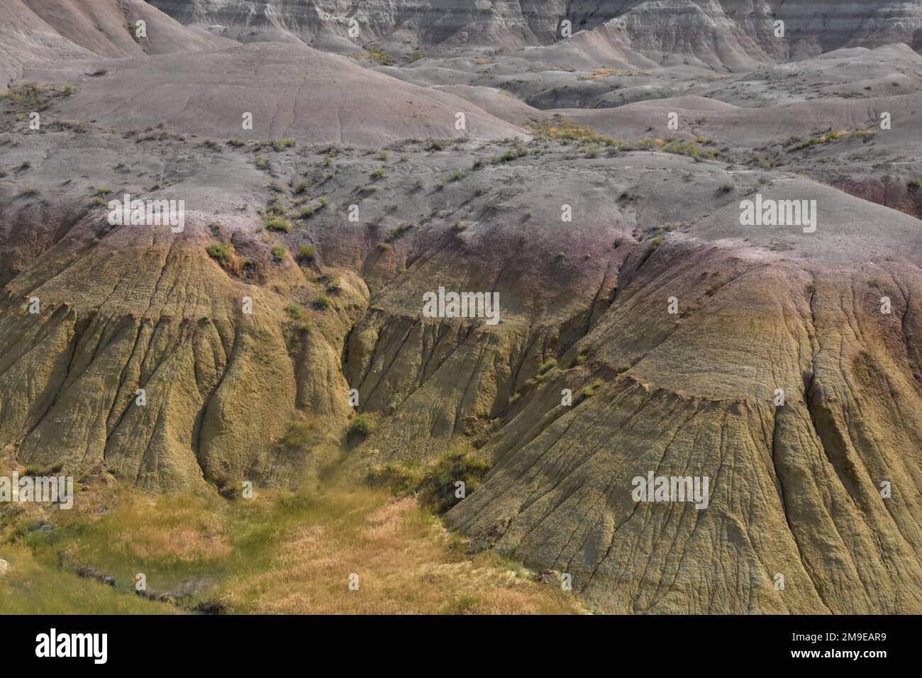 Stunning view of the yellow mounds in the Badlands of South Dakota ...