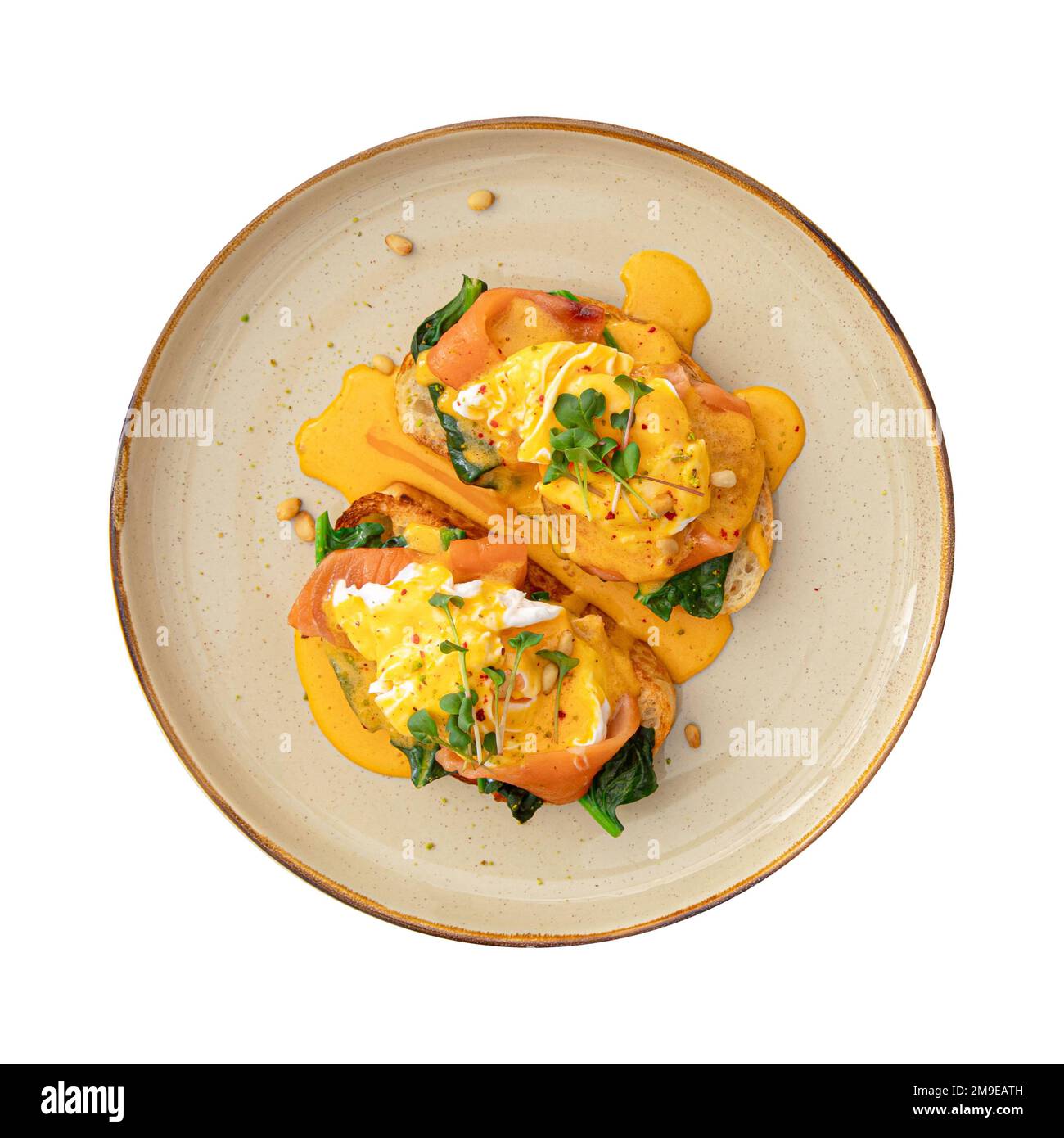 Portion of eggs benedict toast with salmon Stock Photo - Alamy