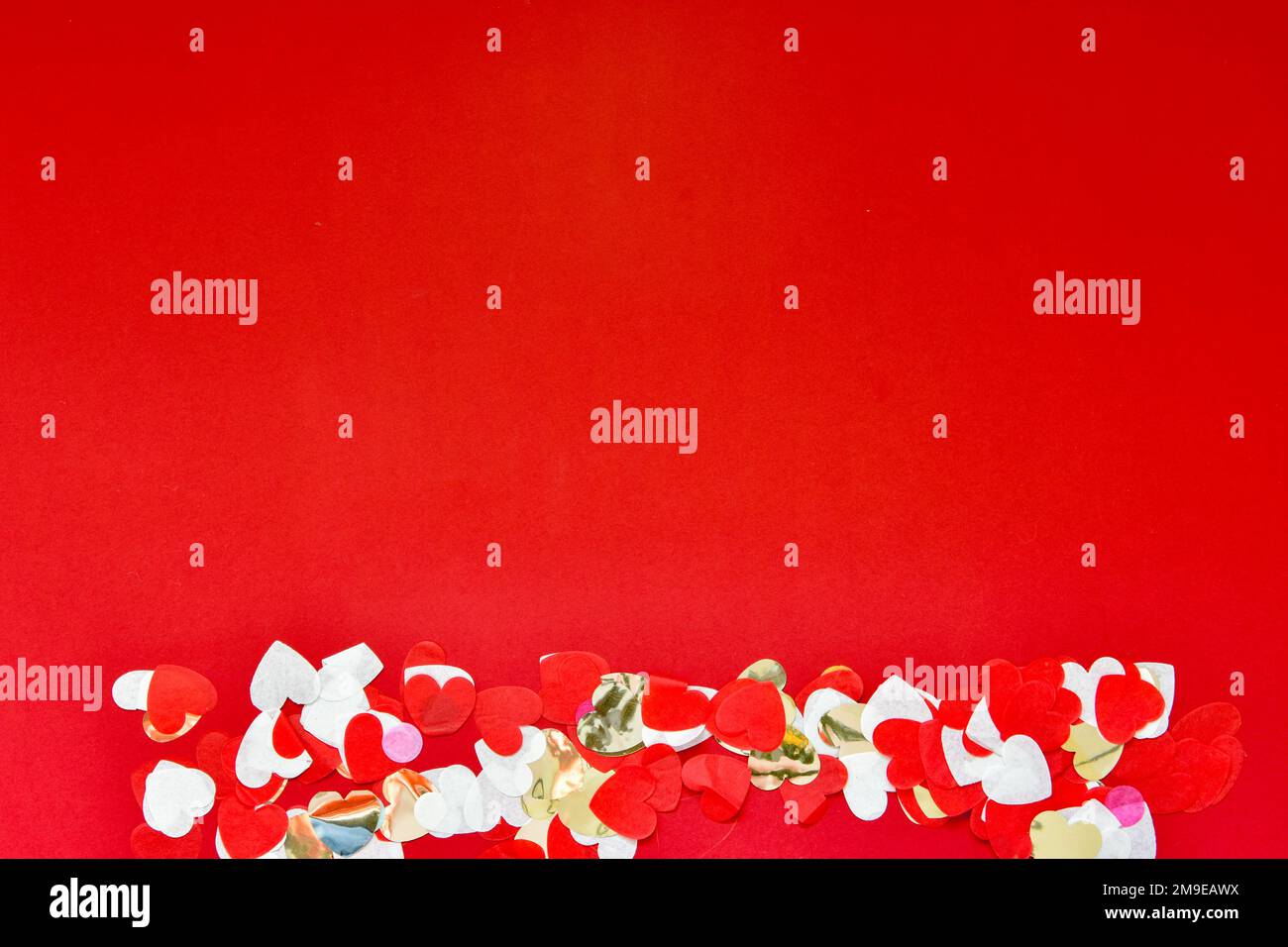 Hearts of paper on red textured background. San Valentine day concept ...