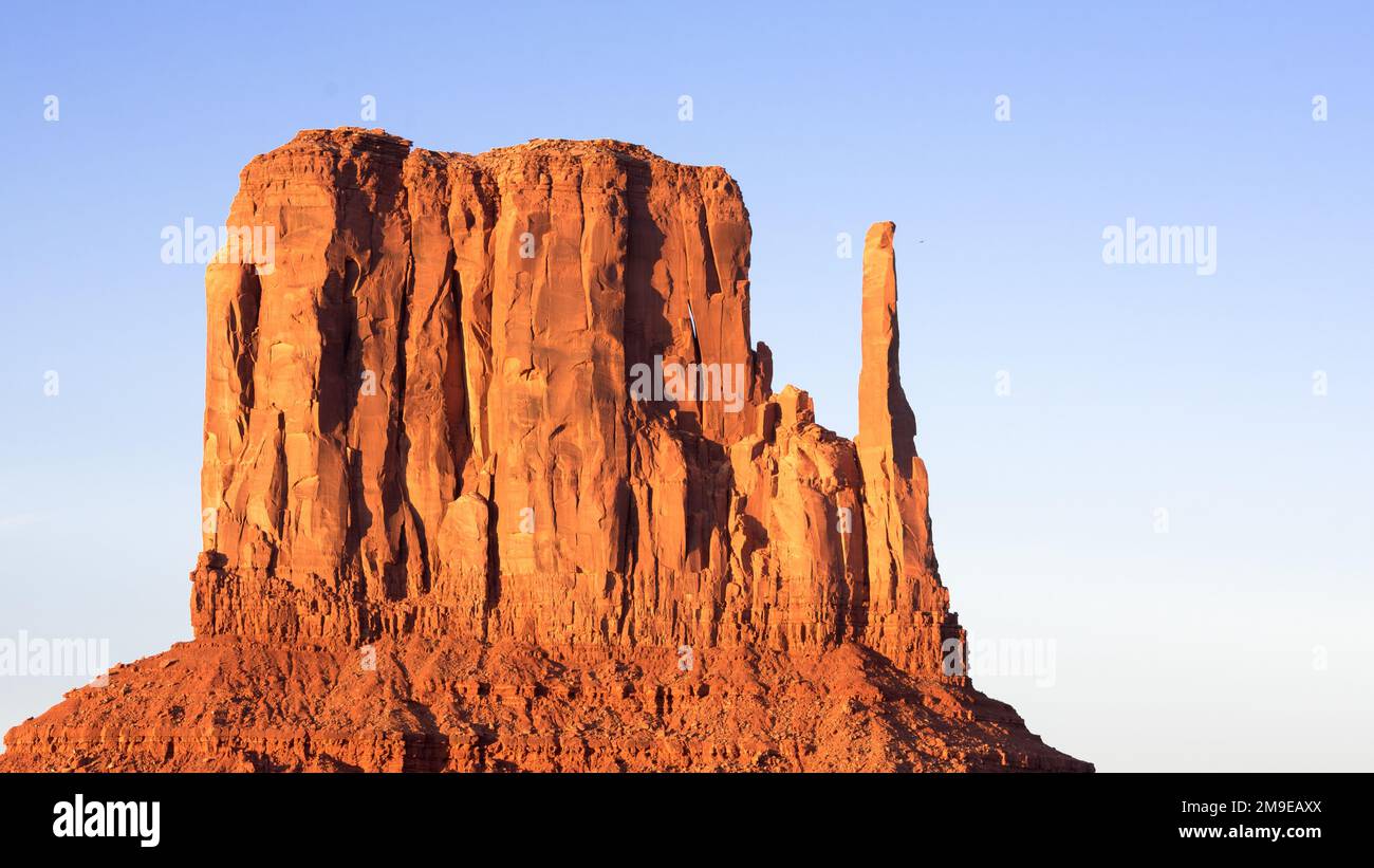 A closeup view of a tall beautiful red canyon with a blue sky on the ...