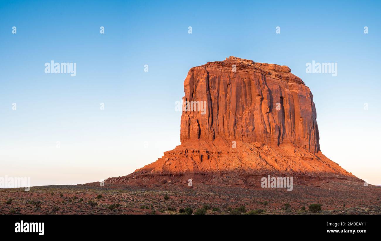 A tall beautiful red canyon with a blue sky on the horizon Stock Photo ...