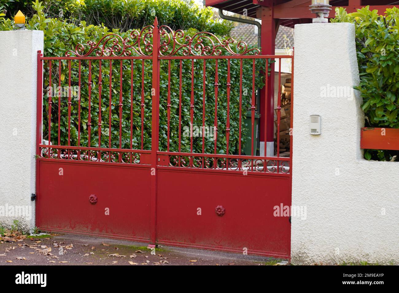 Red brick house security gate hi-res stock photography and images - Alamy