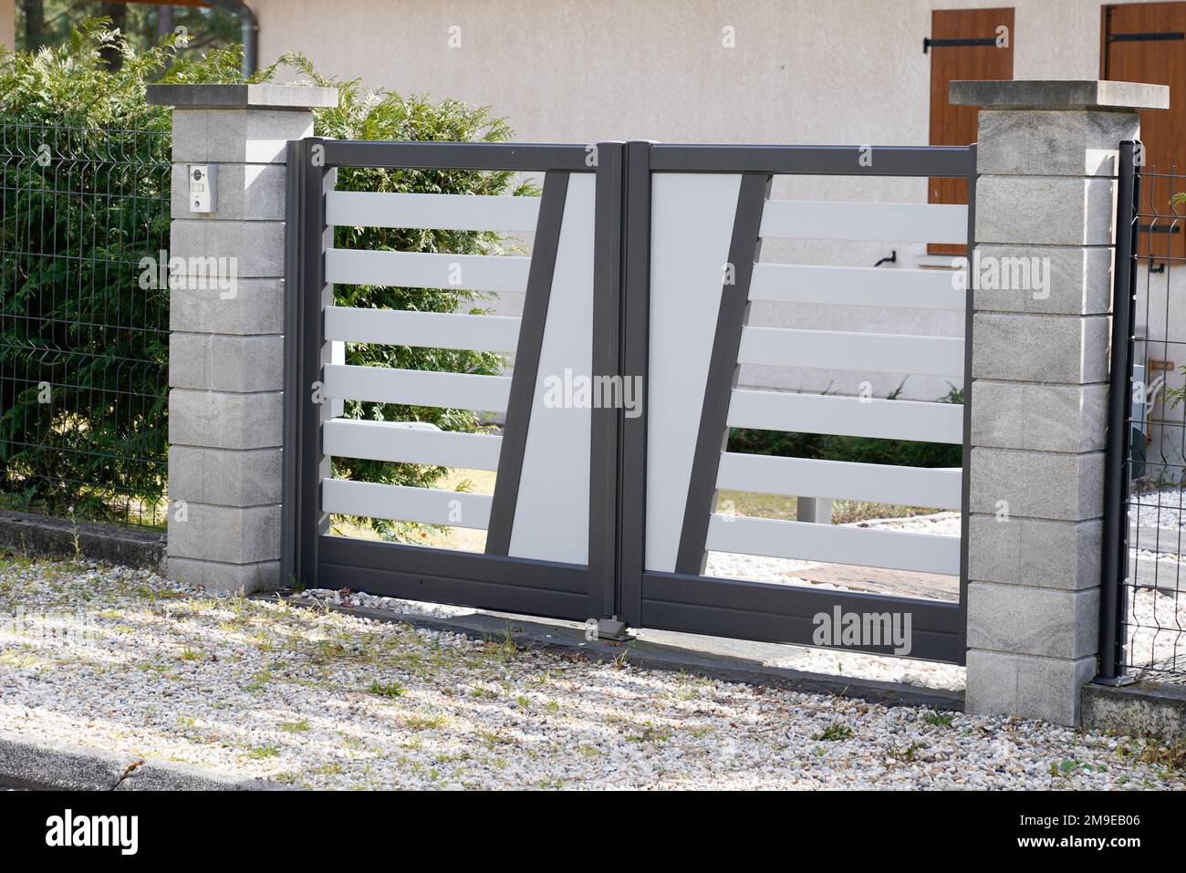 grey steel white design home portal of a house Stock Photo - Alamy