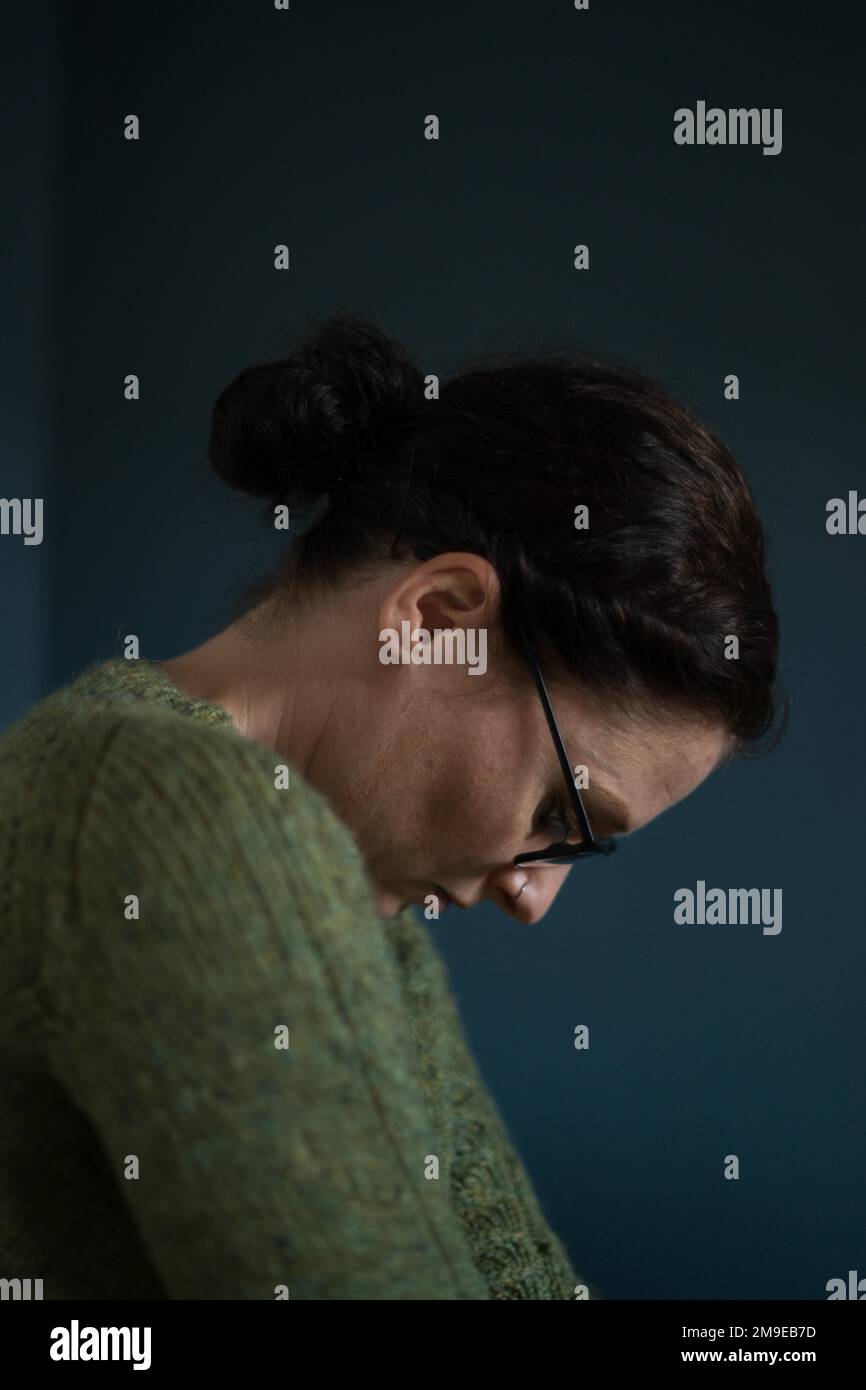 Sad woman interior portrait hi-res stock photography and images - Alamy