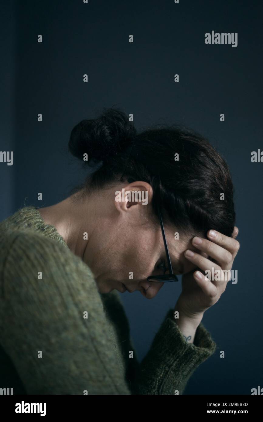 Sad woman interior portrait hi-res stock photography and images - Alamy