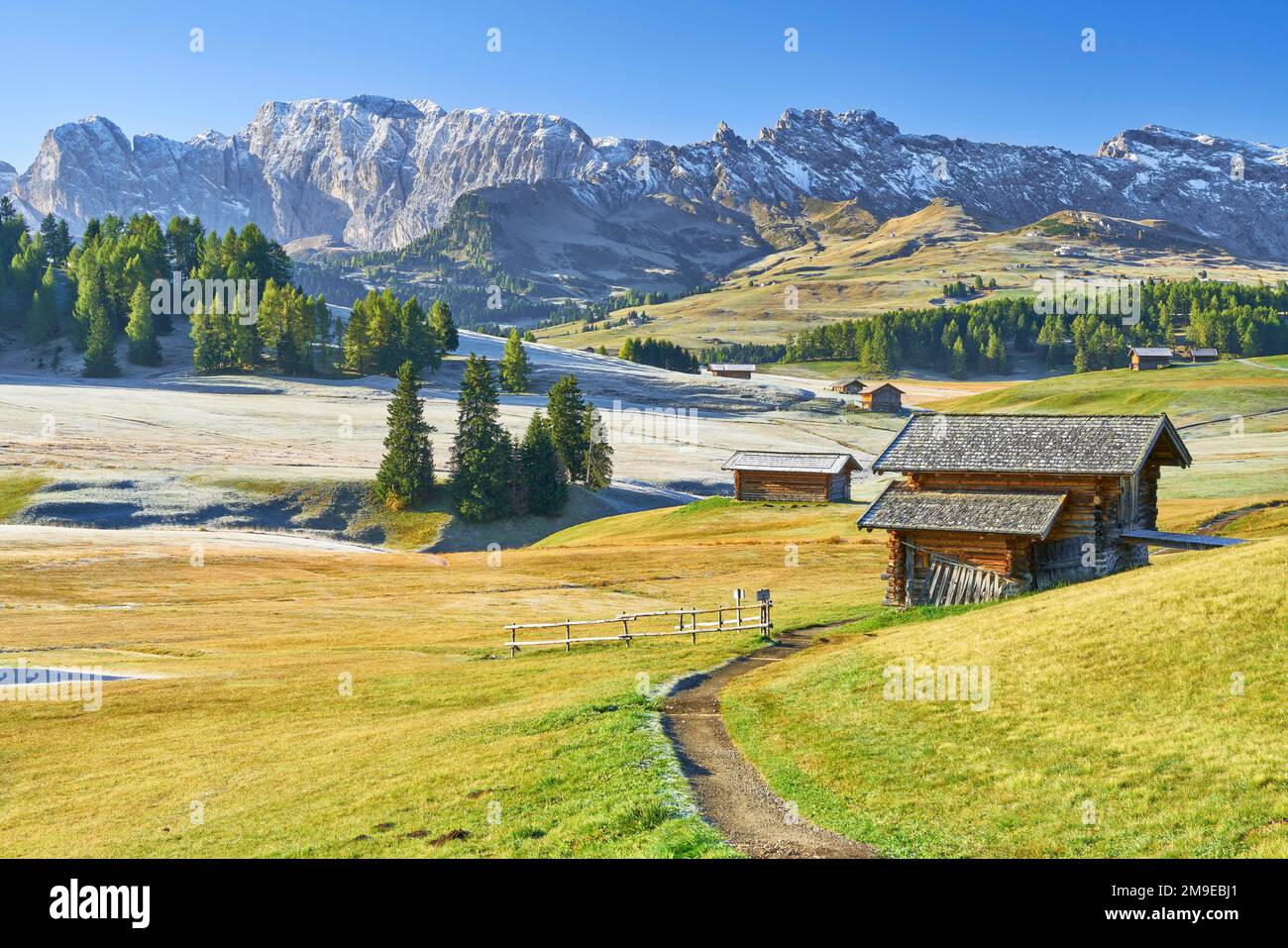 Alpine huts in the morning frost, Dolomites, Alpe di Siusi, South Tyrol ...