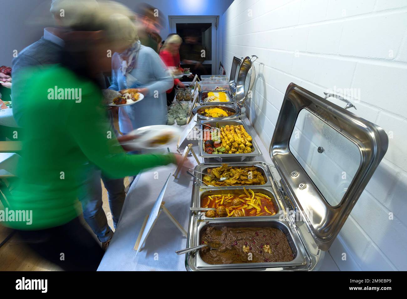 Guests at the Persian buffet at a party, Bavaria, Germany Stock Photo ...