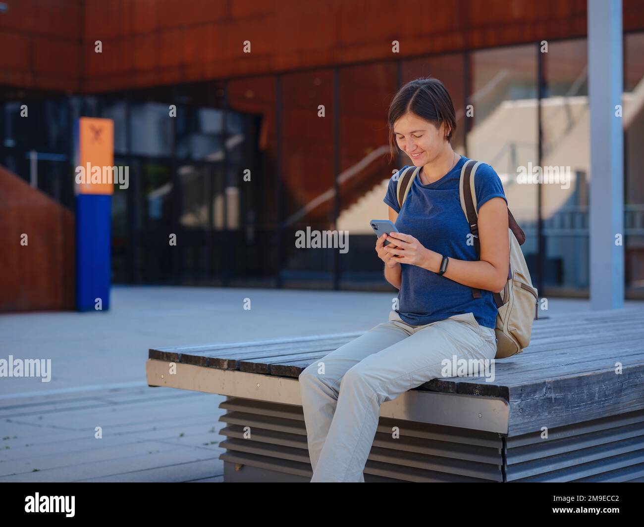 Cheerful asian female student standing outdoors, happy young eastern ...