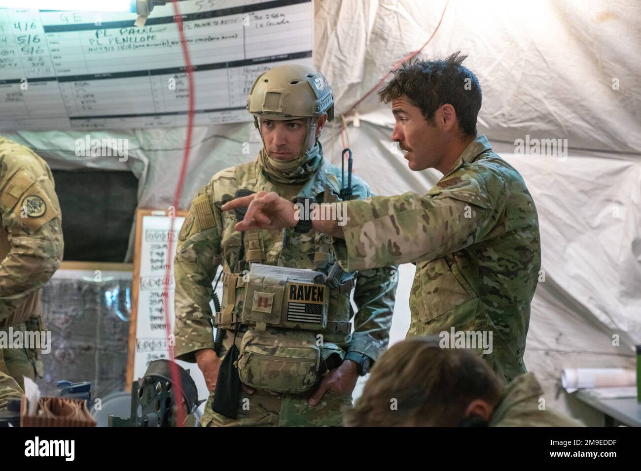 U.S. Air Force Tech Sgt. Stephen L. Mynatt II, (right) a Tactical Air Control Party specialist ...