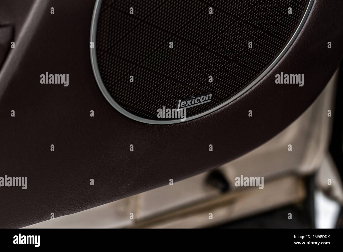 MOSCOW, RUSSIA - DECEMBER 04, 2021 Lexicon by Harmankardon speaker grille. Modern car Interior ...