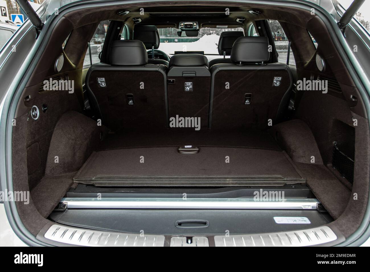 View of the rear storage area in a SUV car. Clean, open empty trunk ...